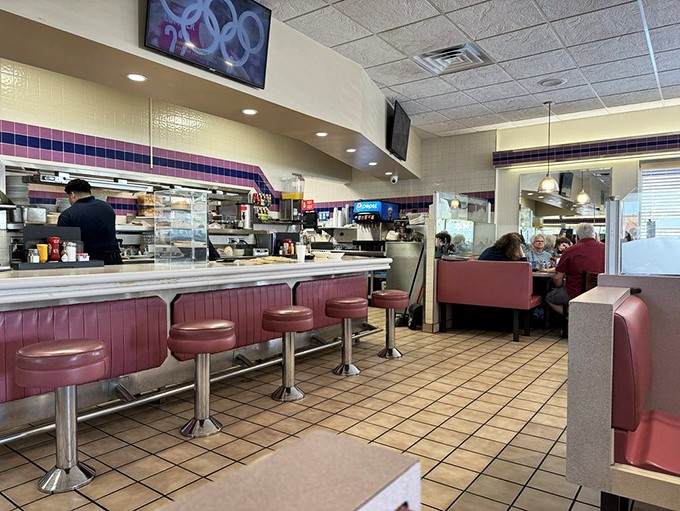 The classic diner counter&mdash;where solo diners find community and everyone gets a front-row seat to the breakfast ballet.