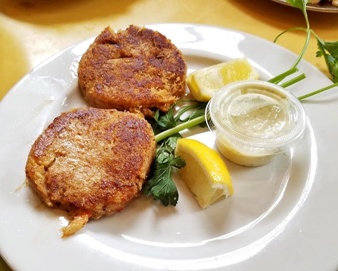 Crab cakes with the perfect ratio of crab to binding&mdash;mostly crab, just enough "other stuff" to hold it together. That golden crust deserves a standing ovation.