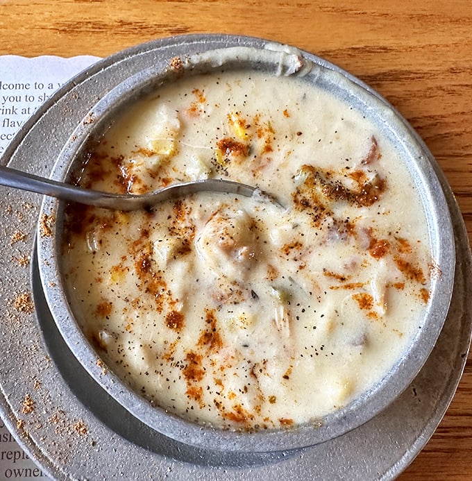 This isn't just soup&mdash;it's a creamy treasure hunt where each spoonful reveals delicate morsels of crab hiding among velvety, seasoned perfection.