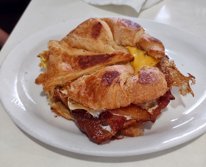This croissant breakfast sandwich proves that sometimes the French and Americans can collaborate on something truly beautiful.