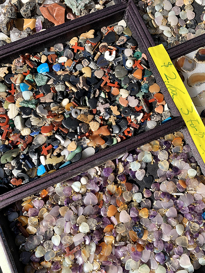 Earth's glittering secrets in neat little trays. These crystal hearts and gemstone pendants bring new meaning to "rock collection."