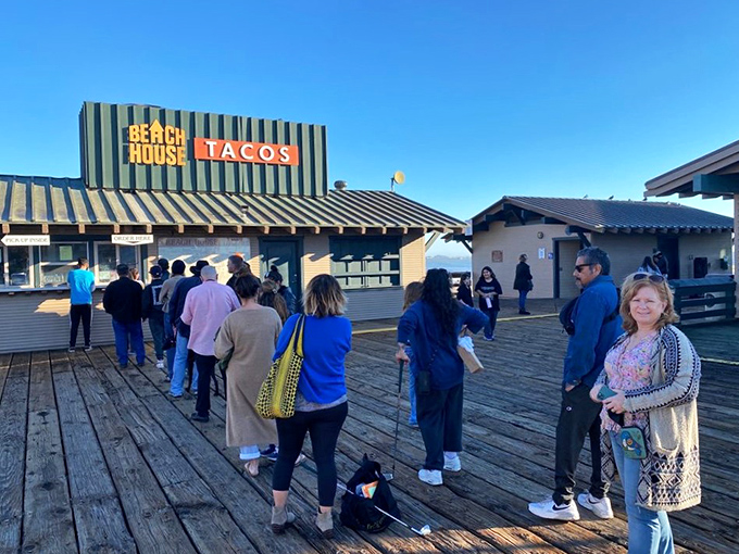 The line forms early at Beach House Tacos, where waiting becomes part of the experience rather than a chore.