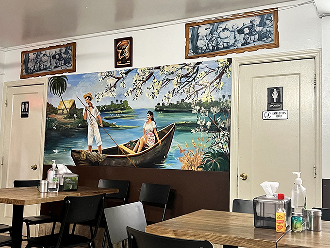 Pastoral murals depicting serene Mexican countryside scenes provide a tranquil backdrop for the flavor explosion happening on your plate.