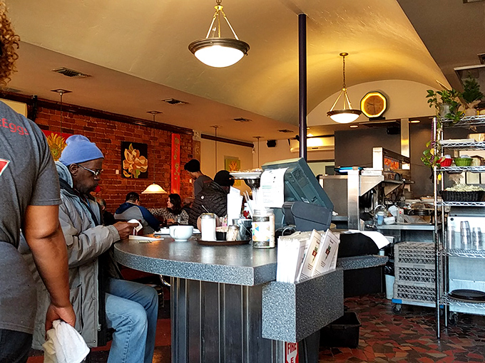 The counter seating &ndash; where strangers become temporary breakfast companions united by the universal language of "pass the hot sauce, please."