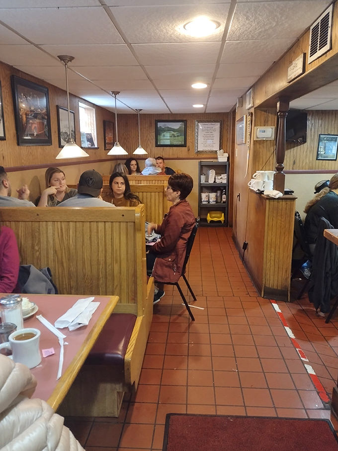 The dining room hums with conversation&mdash;a community center disguised as a restaurant where Pittsburgh solves its problems.