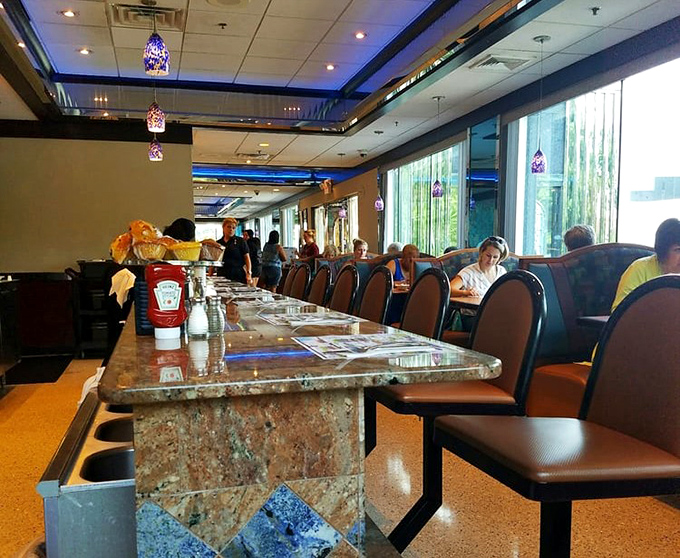 Sunlight streams through the windows, illuminating a dining room where countless family stories, first dates, and business deals have unfolded over plates of comfort food.