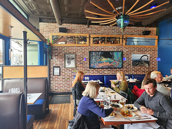 Diners lean into conversations and seafood feasts, proving that the best social network has always been a table surrounded by friends and good food.