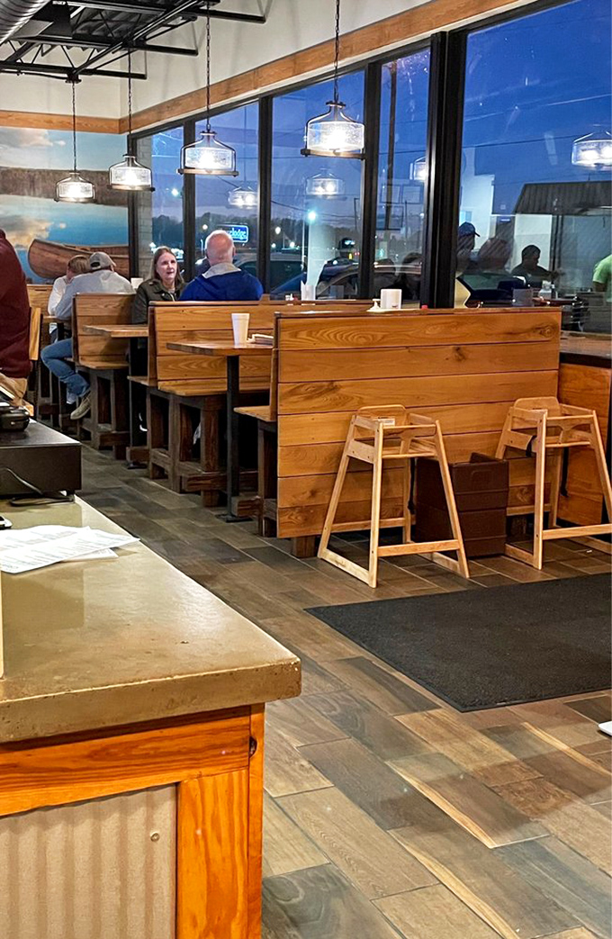 These aren't just dining booths&mdash;they're confession booths where people admit their undying love for properly smoked meat.