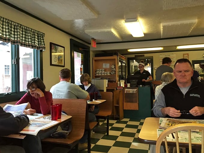 Where locals gather to solve the world's problems over coffee and breakfast. The newspaper might change, but the conversations rarely do.