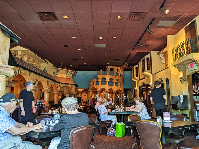 The dining room buzzes with the universal language of good food—forks twirling, conversations flowing, and memories being made.