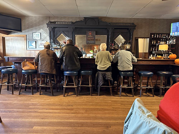 The bar on a typical afternoon&mdash;where locals and visitors alike gather to share stories and anticipate the culinary delights to come.