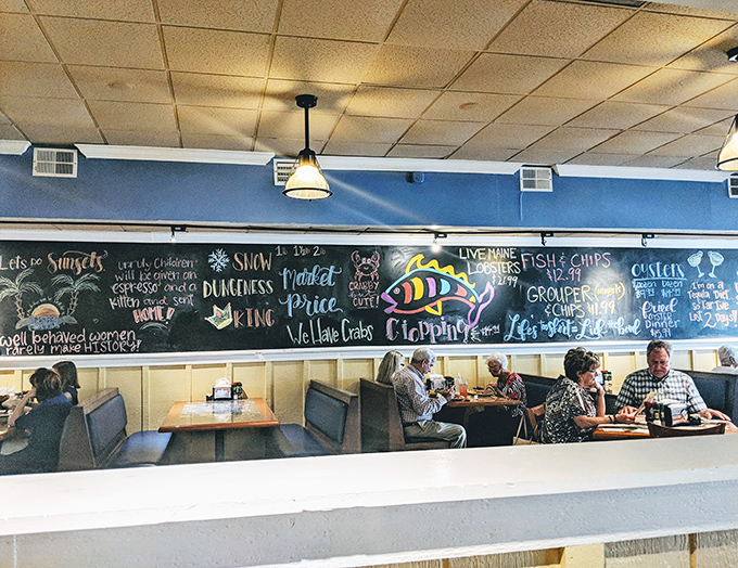 The chalkboard specials wall – where daily catches become daily temptations written in colorful, ephemeral promises of seafood bliss.
