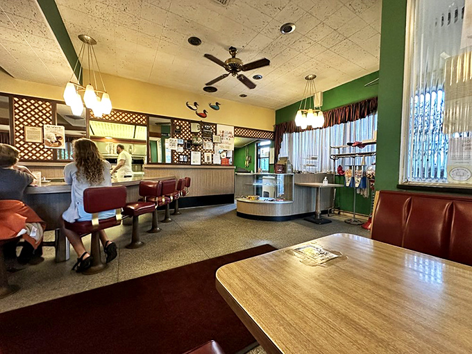 The dining room where strangers become regulars and regulars become family. Notice how nobody's staring at their phones? That's the Chef-O-Nette effect.