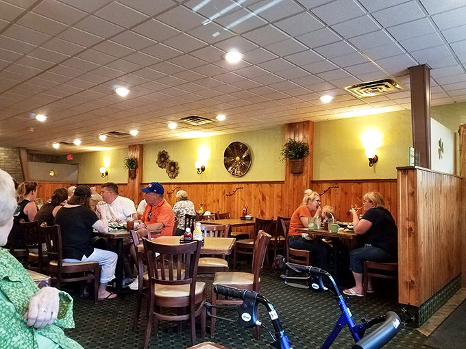 Where strangers become regulars and regulars become family. The dining room hums with the universal language of good food and conversation.