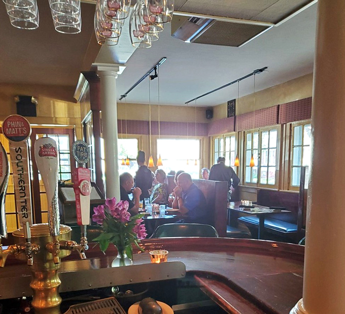 Tables full of diners savoring every bite, sharing that universal experience of discovering food that exceeds all reasonable expectations.