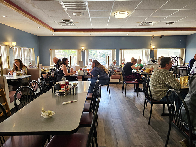 Where strangers become neighbors over plates of comfort food, sharing nothing more complicated than the universal language of "pass the syrup, please."