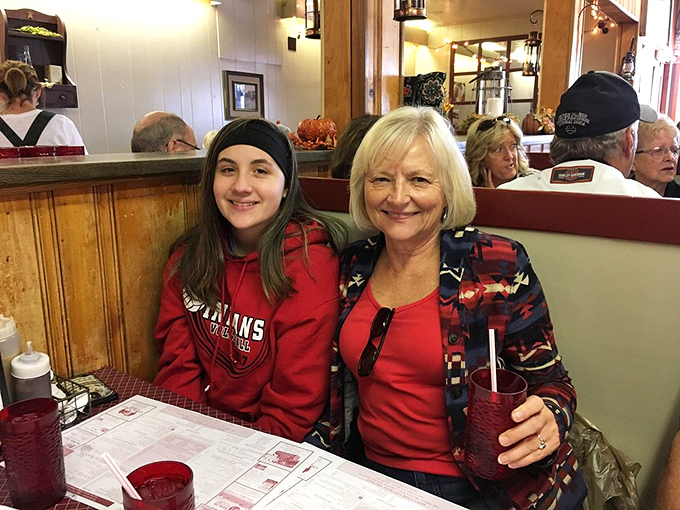 The dining room where strangers become friends over shared appreciation of food that tastes like someone's grandmother made it.