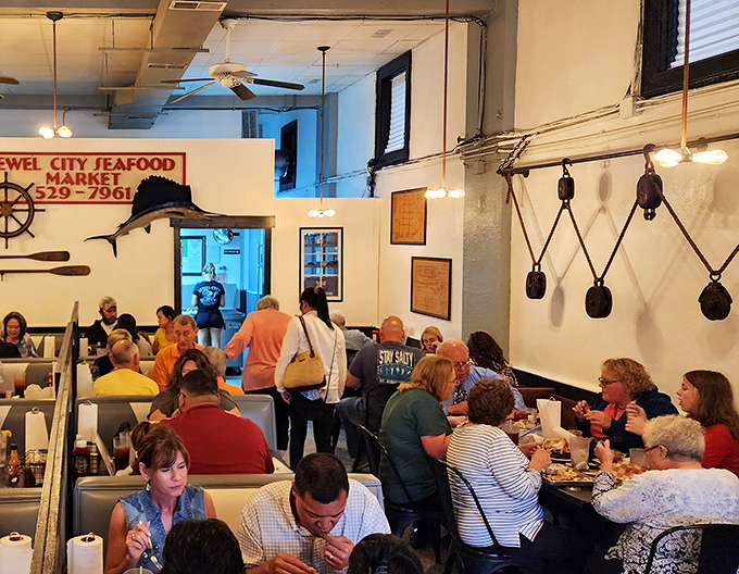 A packed house of happy diners proves the universal truth: great seafood brings people together. The buzz of satisfaction is almost as delicious as the food.