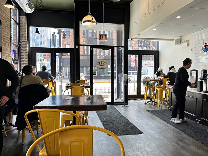 The dining area offers front-row seats to Chicago street life, where every table tells stories of Italian beef conquests past and present.