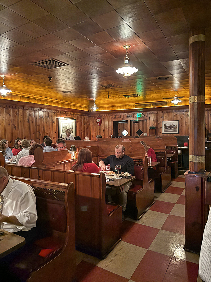 These wooden booths have witnessed more celebrations, business deals, and first dates than a Vegas wedding chapel &ndash; with better food.