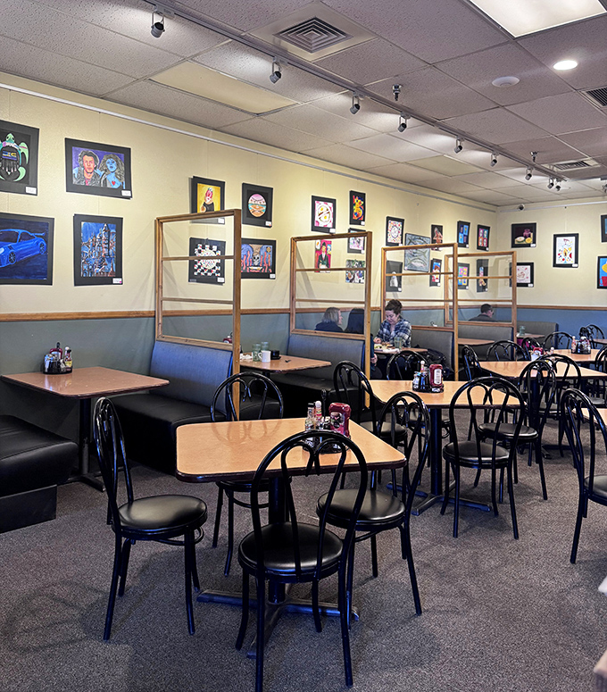 Social distancing dividers can't contain the artistic spirit – local artwork transforms dining into a gallery experience.