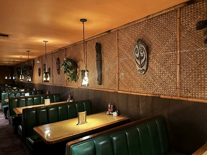 Green booths line bamboo-covered walls adorned with tiki masks. It's like dining in the rumpus room of a 1960s Polynesian-obsessed movie star.