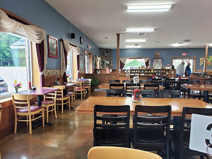 Wooden tables and blue walls create that perfect blend of farmhouse charm and practical dining space that seats entire reunion groups.
