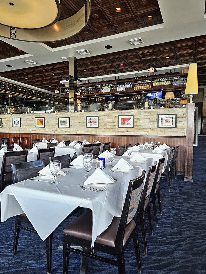 White tablecloths signal "special occasion," but the warm wood accents and comfortable chairs whisper "stay awhile" in the most inviting way possible.