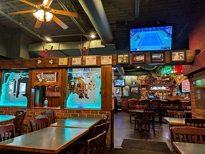 The dining room balances sports bar energy with comfortable seating, creating a space where both die-hard fans and casual diners feel equally at home.