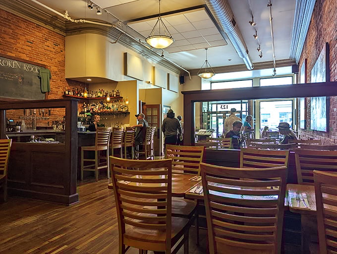 The dining room buzzes with conversation and contentment, where strangers become friends over shared appetizers.