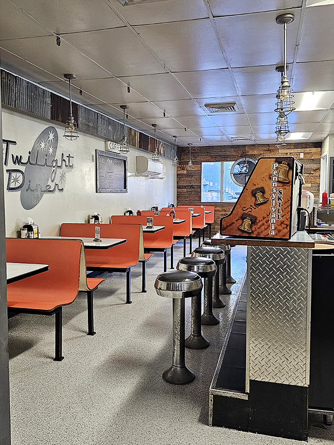 Classic diner booths in cheerful orange invite you to slide in, settle down, and prepare for a meal that won't be rushed or regretted.