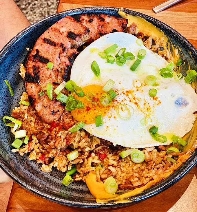 This isn't just fried rice&mdash;it's a Southern-Asian fusion revelation. Perfectly cooked eggs crown a kingdom of flavorful rice while sausage stands guard around the perimeter.