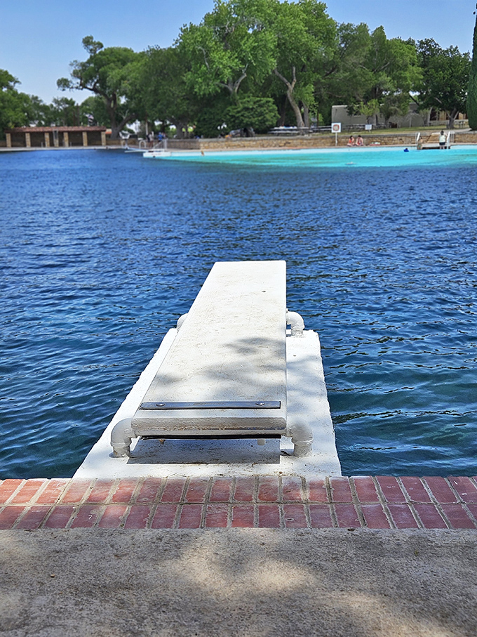 The diving board beckons brave souls to take the plunge into refreshingly cool spring water.
