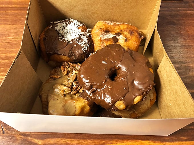 Donuts that don't need social media filters to look irresistible. That chocolate-covered beauty is calling your name.