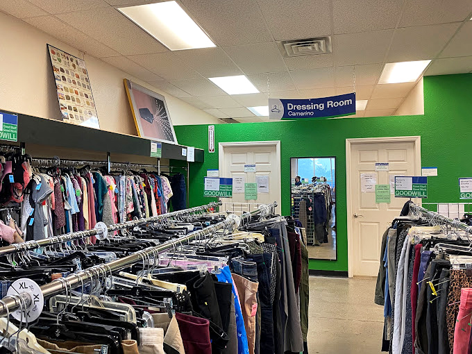 Dressing rooms: the moment of truth in any thrift adventure, where "maybe" transforms into either "absolutely" or "not in this lifetime."