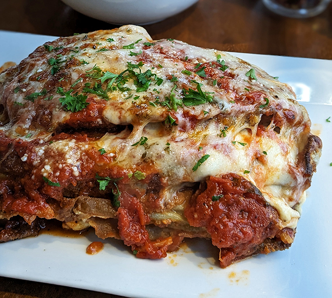 Lasagna that's built like a skyscraper of flavor &ndash; layers upon layers of pasta, sauce, and cheese in a monument to Italian-American ingenuity.