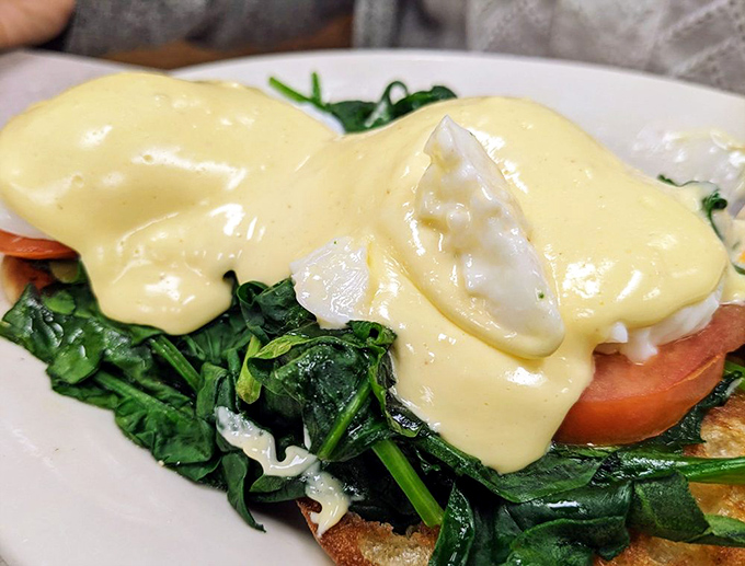 Eggs Florentine with hollandaise cascading like a yellow waterfall. Spinach makes it healthy, right? Let's go with that theory.