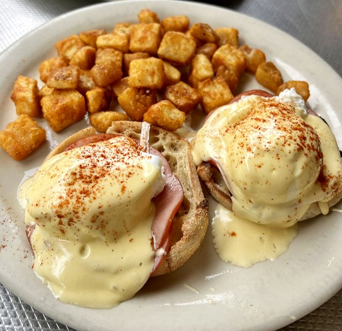 Eggs Benedict that would make a French chef tip his toque &ndash; perfectly poached eggs nestled on Canadian bacon, draped in hollandaise that's sunshine on a plate.