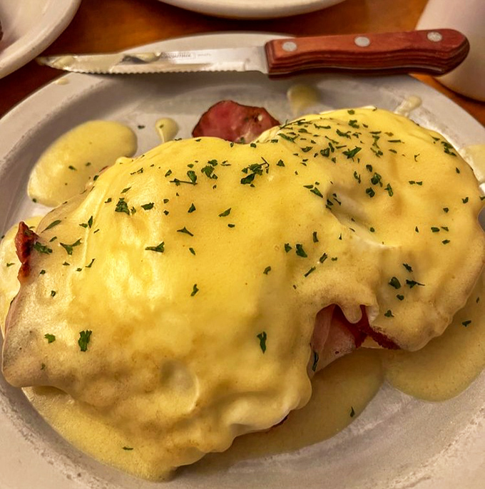 Eggs Benedict done right &ndash; perfectly poached eggs nestled on ham, draped in hollandaise that's rich enough to make you consider moving to Bozeman permanently.