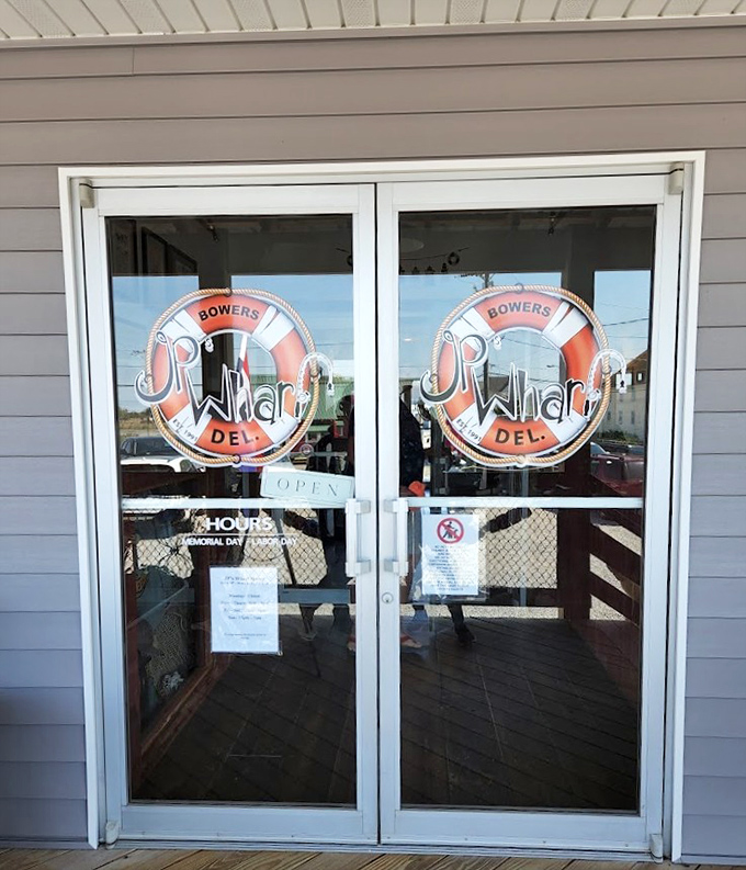 The entrance to seafood paradise comes with a lifesaver logo. These doors separate ordinary days from extraordinary meals with maritime flair.