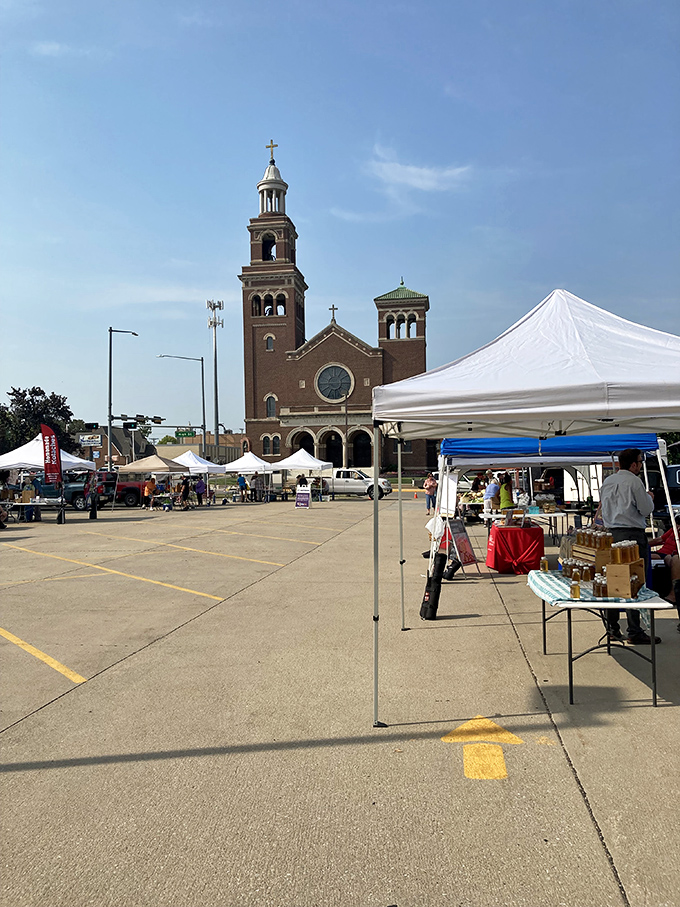 The farmers market transforms a church parking lot into a community gathering spot where faith in good food brings everyone together.