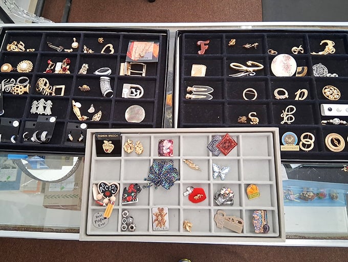 Treasure chest of vintage pins, brooches and rings&mdash;each tiny compartment holds someone's former statement piece waiting for its comeback tour.
