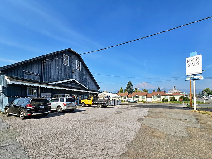 Floyd's Frosty stands ready to satisfy burger cravings with no-nonsense charm, Mount Shasta photobombing in the background like a celebrity neighbor.