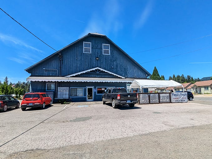 This blue barn-like building houses local flavors and conversations, where "fast food" means the owner remembers your order quickly.
