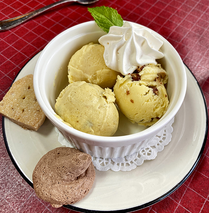 Ice cream served in a proper dish with cookies on the side&mdash;because at a supper club, dessert isn't an afterthought but a grand finale.