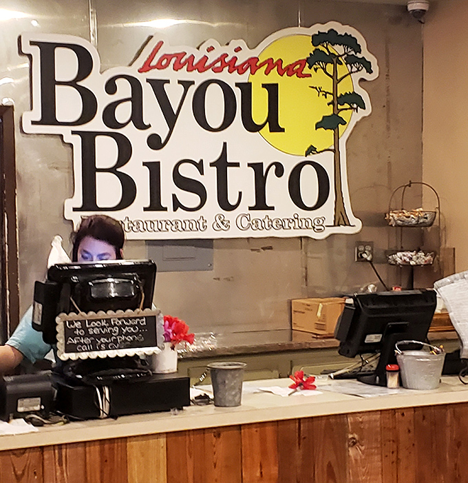 The front counter welcomes you with Southern hospitality and a logo that says, "Yes, we know our bayou cuisine."