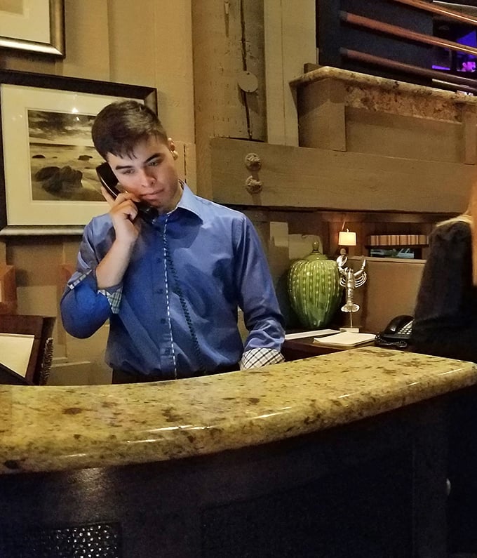 The front desk staff handles reservations with professional efficiency, because coordinating sunset dining for eager crowds requires serious organizational skills.