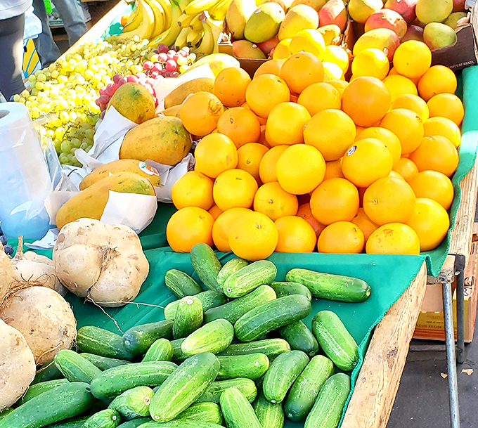 Nature's candy counter gleams in the sunshine. These vibrant fruits and vegetables make grocery store produce look like pale, distant relatives.