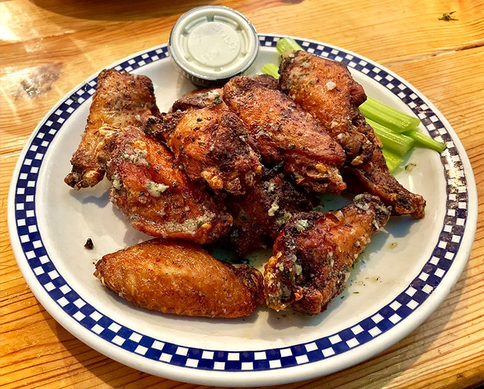 These wings aren't flying anywhere except straight to your happy place. Crispy, saucy, and served with the confidence they deserve.