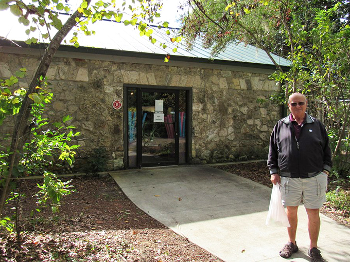 The visitor center stands as a limestone testament to Florida's "old Florida" charm, offering shelter from both sun and souvenir temptation.